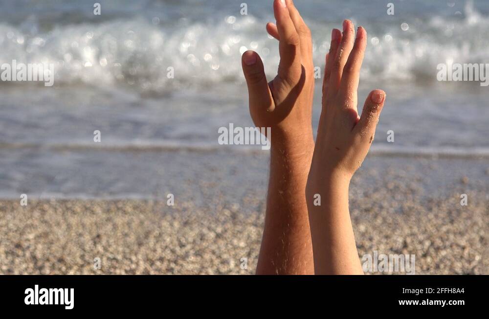 Couple hands joining together on beach, sea waving 4K Stock Video ...