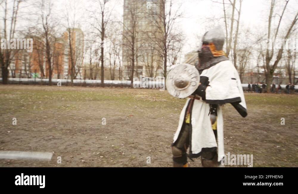 Two warriors hug at Russia-Orda XI-XV centuries on Maneuvers Stock ...
