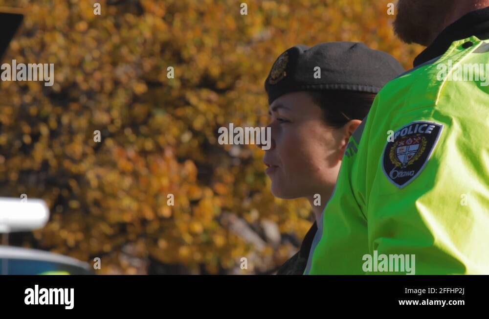 Police Officer and Military speaking in Fall Stock Video Footage - Alamy
