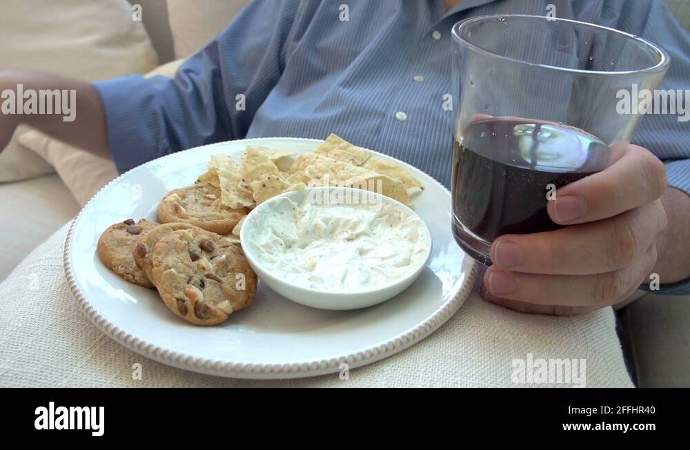 Man eating crisps television Stock Videos & Footage - HD and 4K Video ...