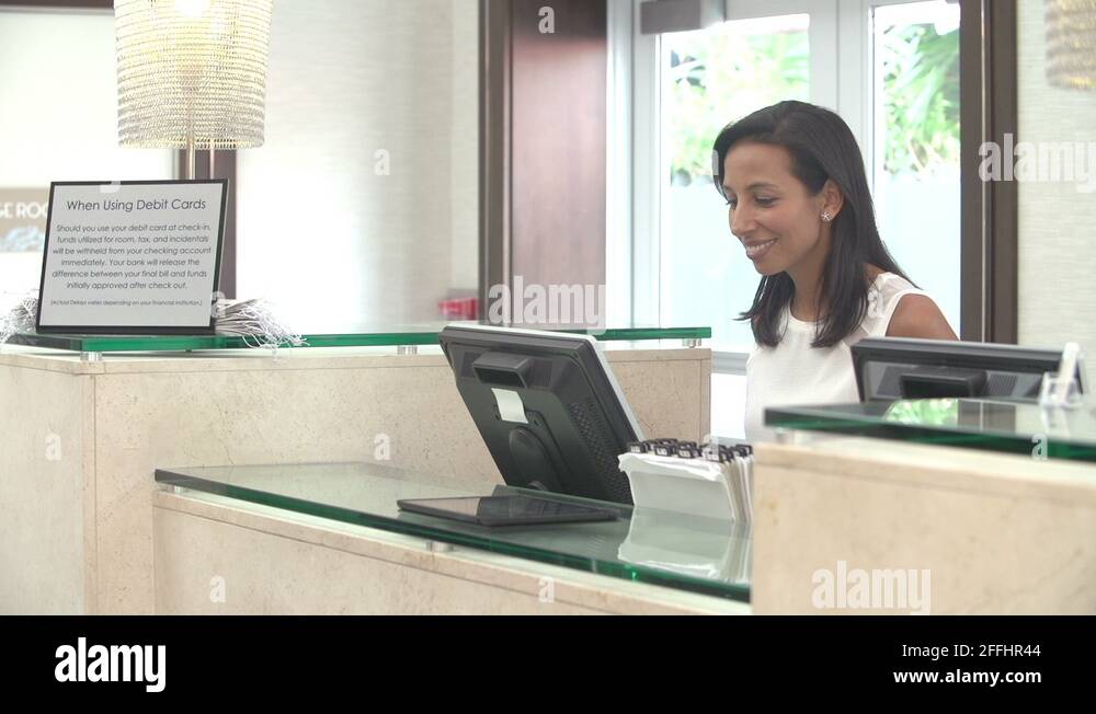 Checking front desk check in Stock Videos & Footage - HD and 4K Video ...
