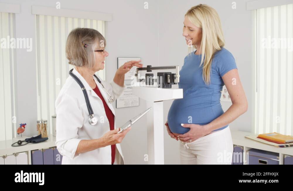 Baby weighing mother scales Stock Videos & Footage - HD and 4K Video ...