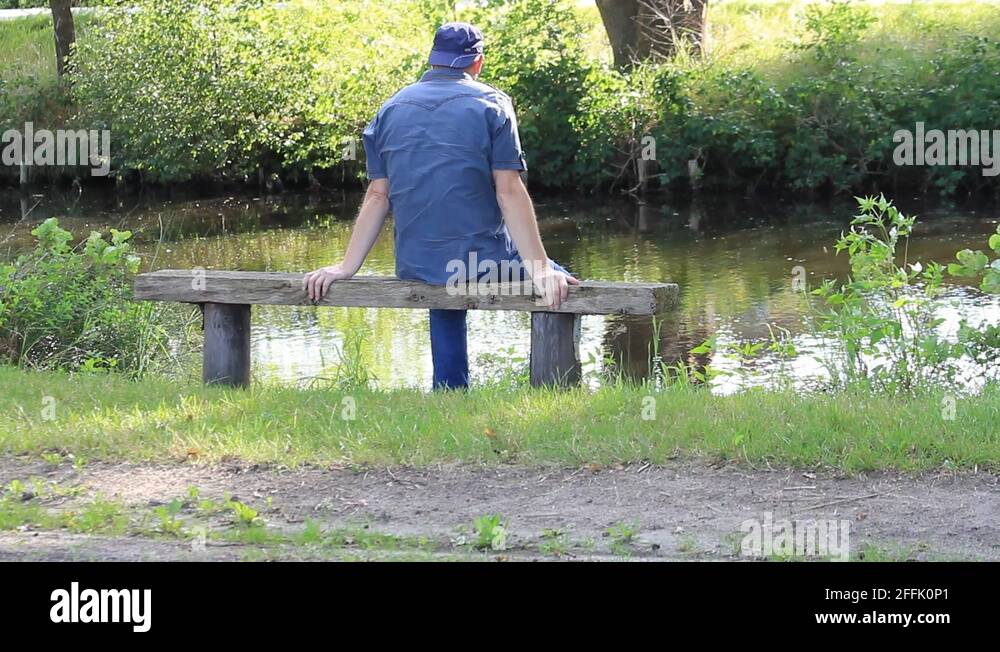 Man lying down bench Stock Videos & Footage - HD and 4K Video Clips - Alamy