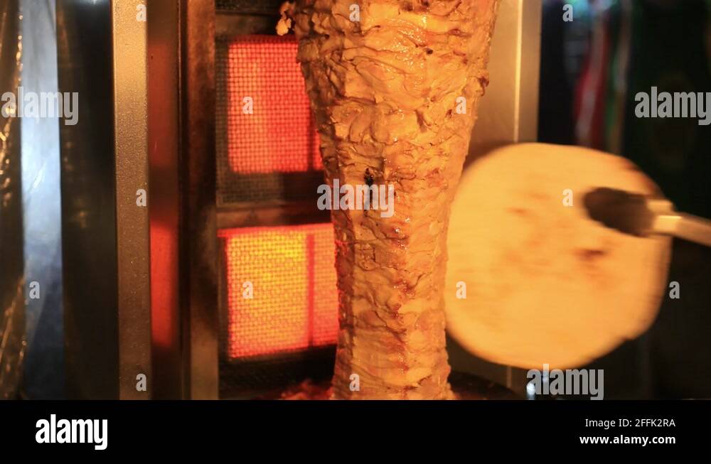 meat roasted on a spit torque in Thailand Market. HD. 1920x1080 Stock ...