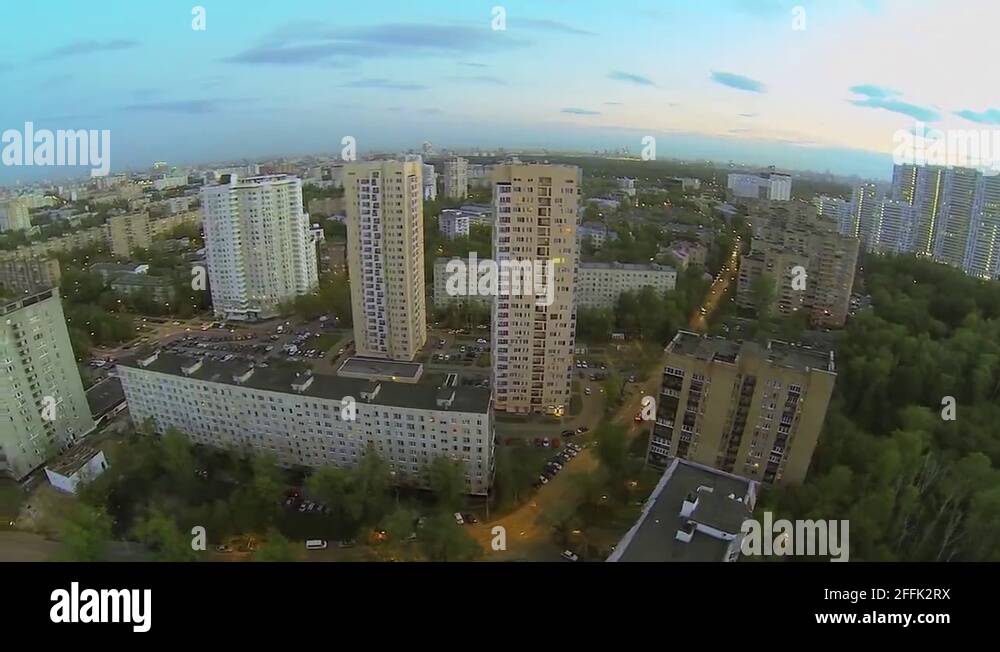 Townscape with tramway line and street traffic at evening Stock Video ...