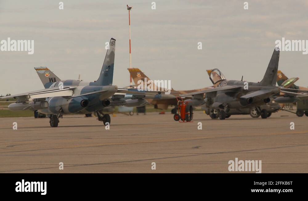 military, Alphajet fighter jet and F16s in bg Stock Video Footage - Alamy