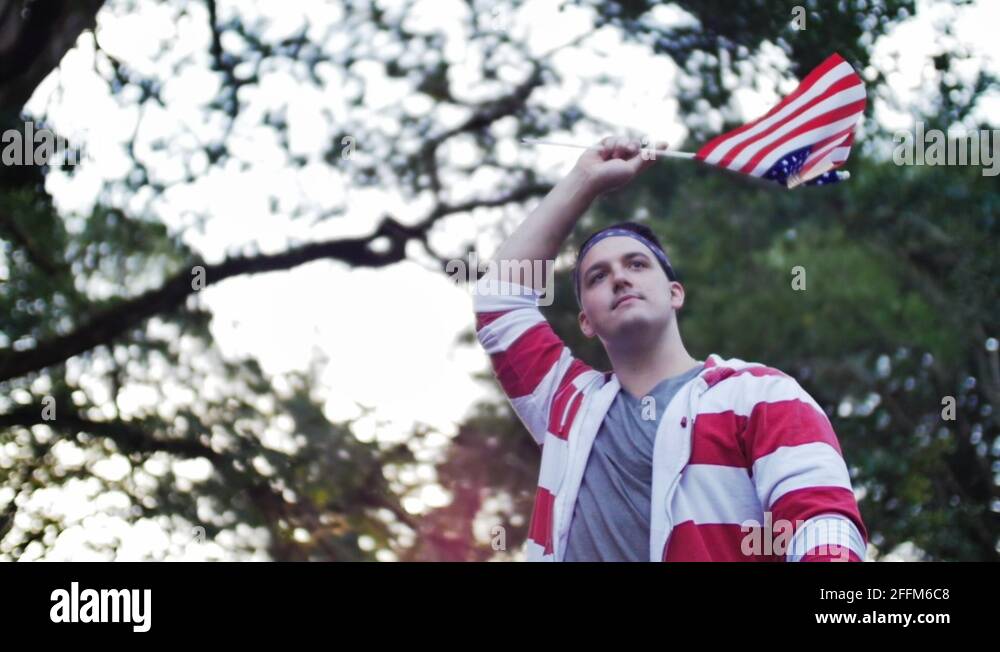 Waving an american flag Stock Videos & Footage - HD and 4K Video Clips ...