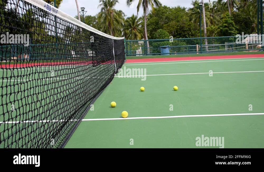 Resort Tennis Club and Tennis Courts with Balls Stock Video Footage - Alamy