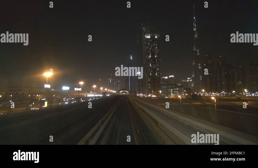 POV Point of view Burj Khalifa tall tower skyscraper Dubai city night ...