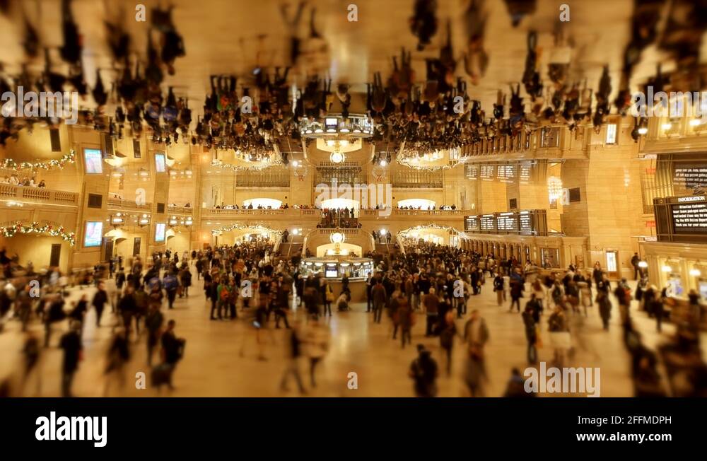 very crowded train station hallway. busted city scene. crowded people ...