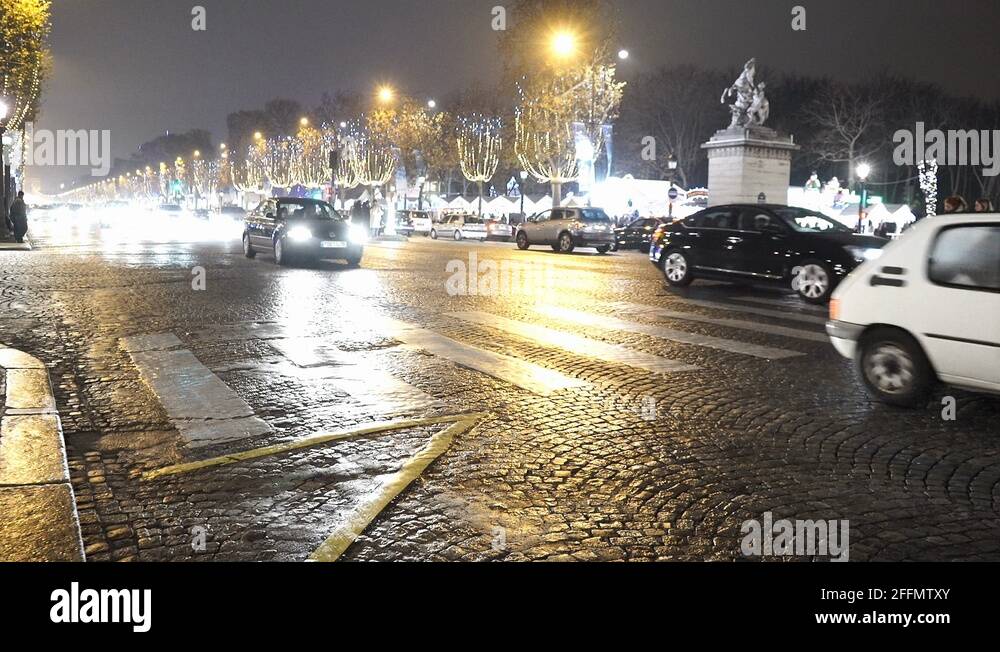 Street traffic on Champs Elysees Paris by night Stock Video Footage - Alamy