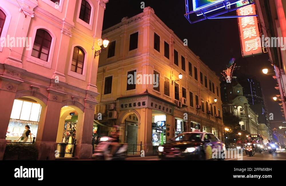 Colorful night downtown road with traffic jam in Macau Stock Video ...
