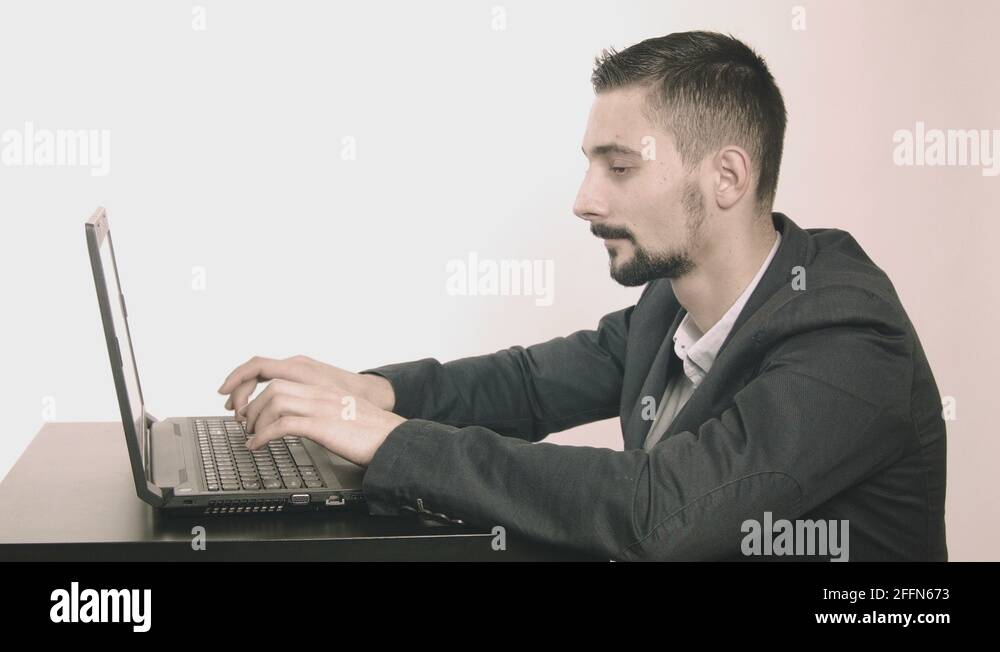 Man behind desk looking into camera Stock Videos & Footage - HD and 4K ...