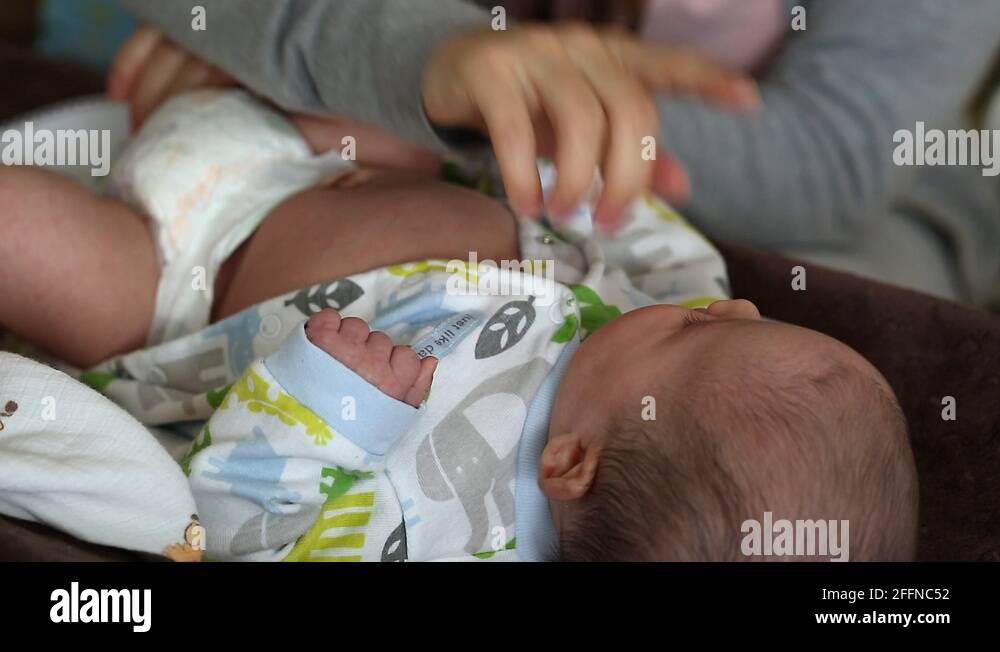 Baby mother change clothes diaper Stock Videos & Footage - HD and 4K ...