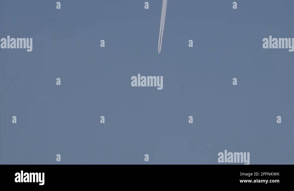 ULTRA HD 4K Plane trash blue sky aircraft transit white smoke air ...