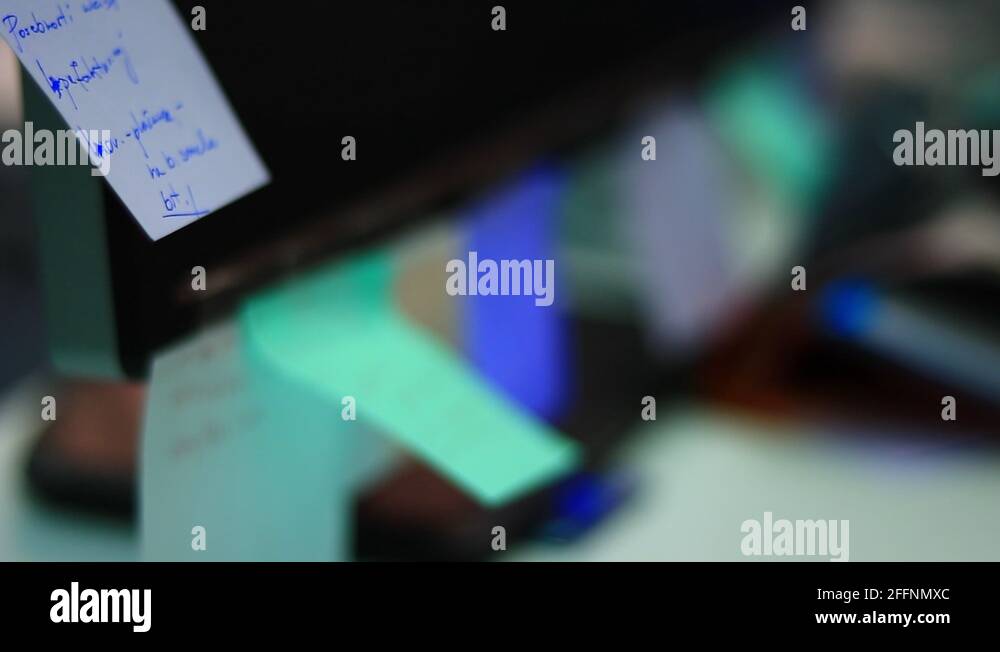 Post it note on the screen of computer Stock Videos & Footage - HD and ...