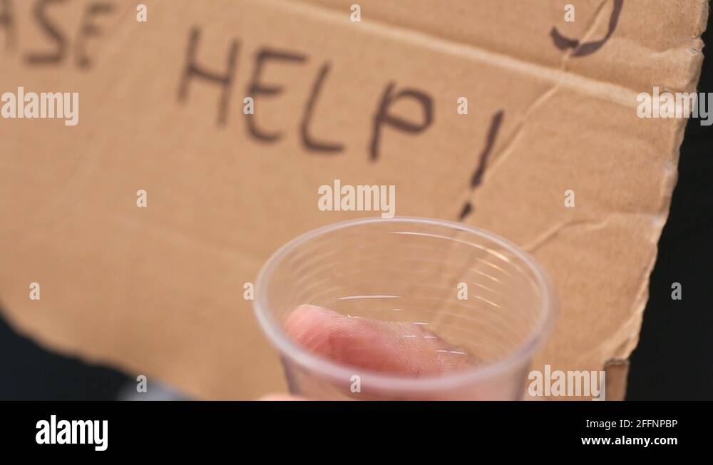 Donation cup Stock Videos & Footage - HD and 4K Video Clips - Alamy