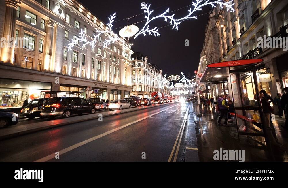 London Regent street by night Bus arriving at bus stop Stock Video ...