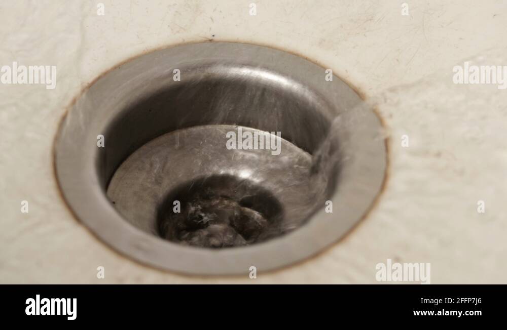 Water down the drain Stock Videos & Footage - HD and 4K Video Clips - Alamy