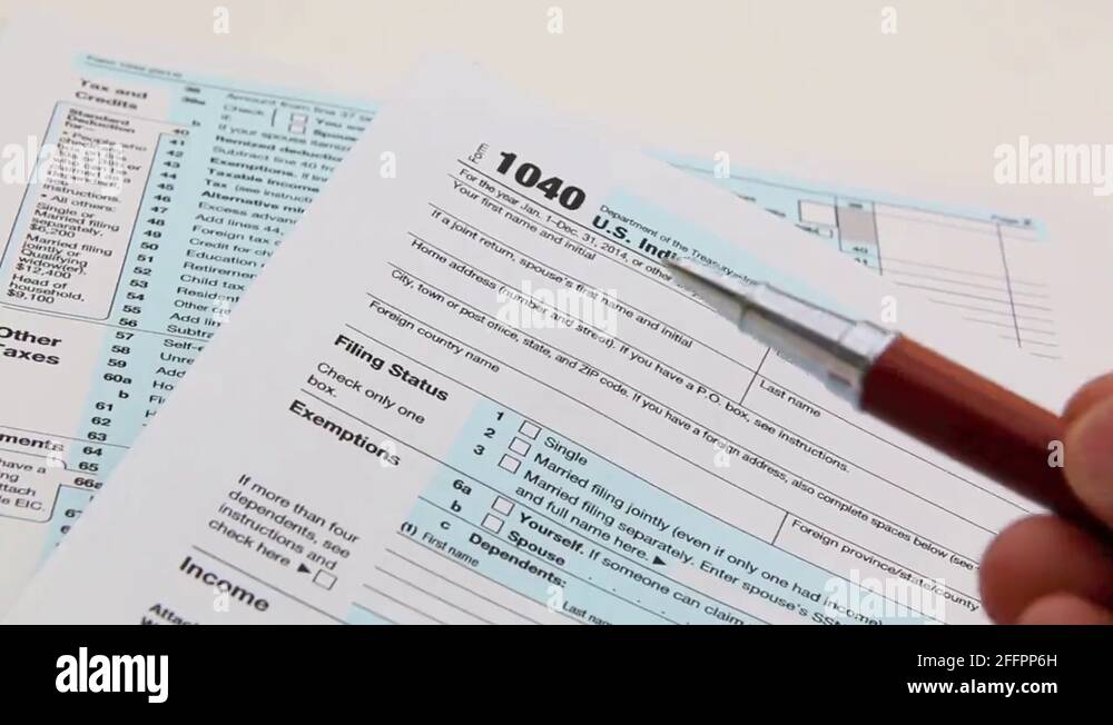 W 2 form deductions Stock Videos & Footage - HD and 4K Video Clips - Alamy