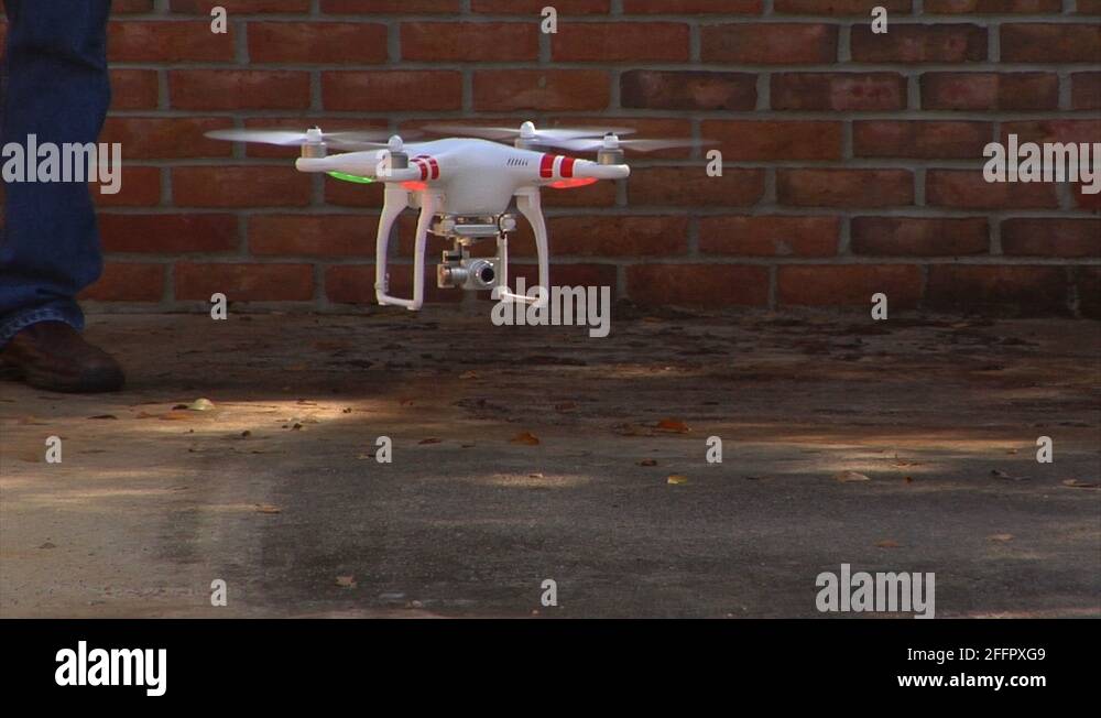 UAV-18, drone helicopter, licensed pilot, CU, reveals pilot walking ...