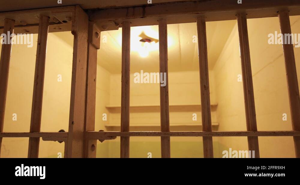 Prison jail cells in Alcatraz tilt down Stock Video Footage - Alamy