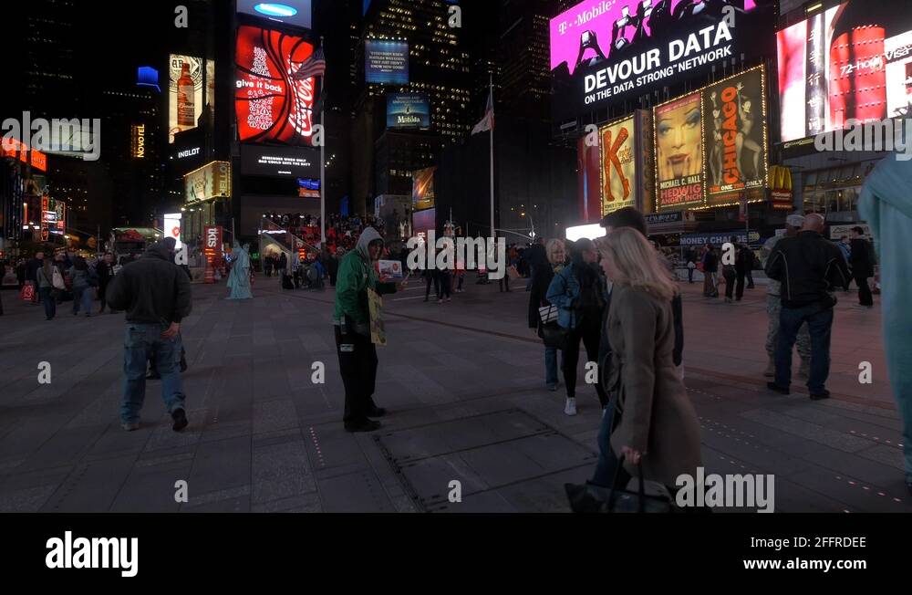 Walking in Times Square at night in 4K Stock Video Footage - Alamy