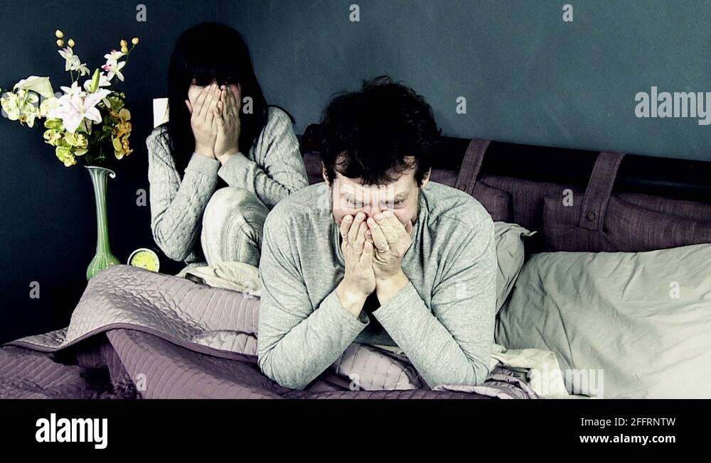 Sad couple bed Stock Videos & Footage - HD and 4K Video Clips - Alamy