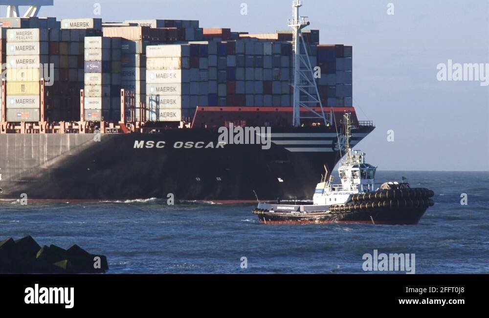 MSC Oscar, the largest container ship + tug assist Stock Video Footage ...