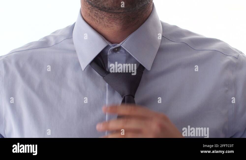 Man tightening tie Stock Videos & Footage - HD and 4K Video Clips - Alamy