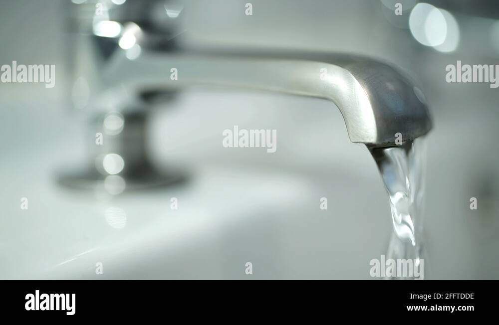 Running a tap Stock Videos & Footage - HD and 4K Video Clips - Alamy