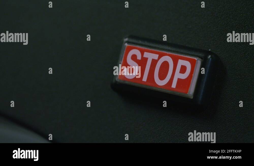 Female hand pushing the emergency stop button Stock Video Footage - Alamy