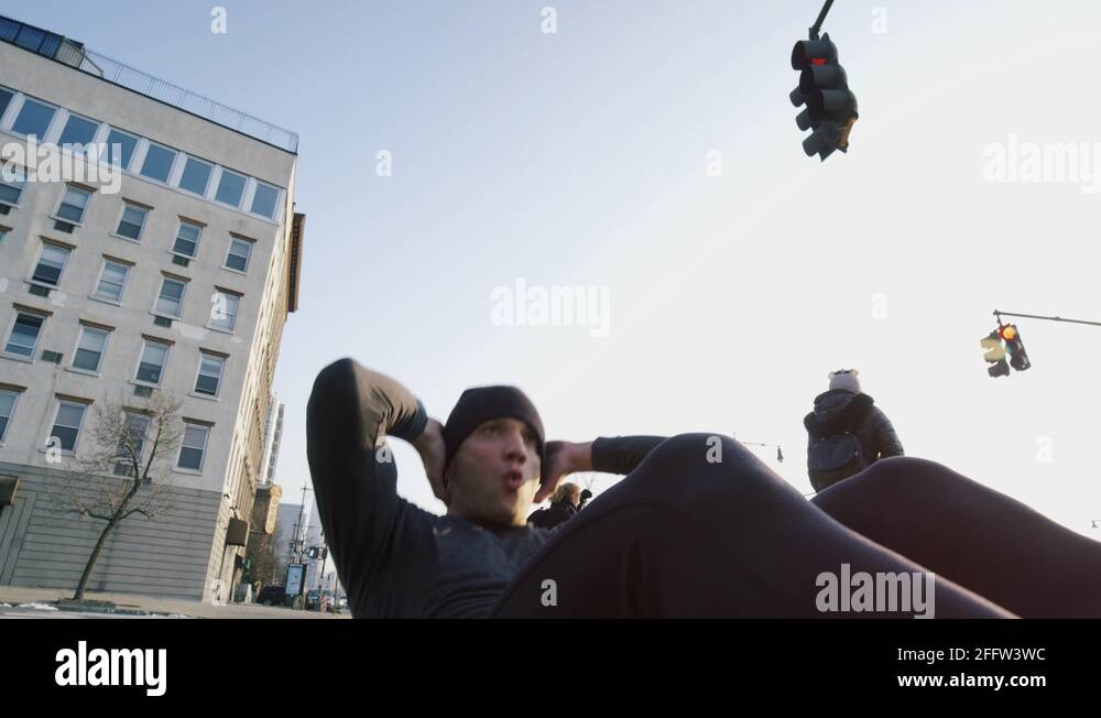 Man sit ups Stock Videos & Footage - HD and 4K Video Clips - Alamy