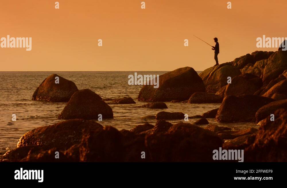 Angler man fishing from beach Stock Videos & Footage - HD and 4K Video ...