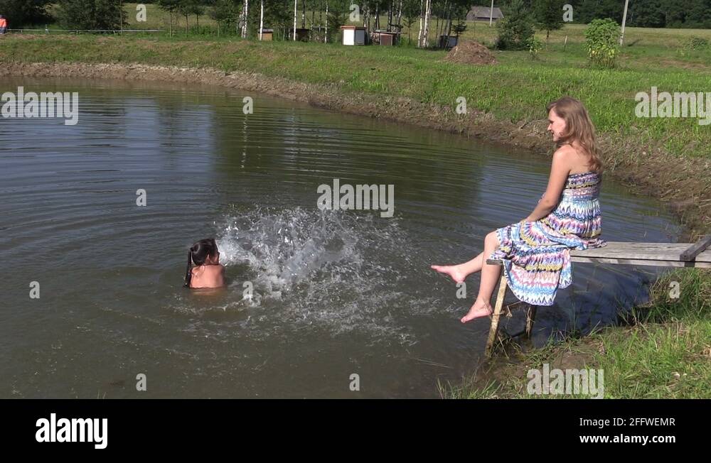 Girl splash Stock Videos & Footage - HD and 4K Video Clips - Alamy