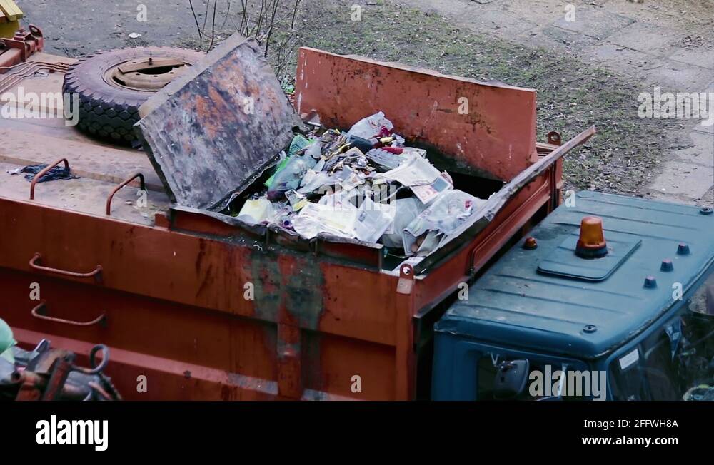 Garbage Truck Sweeps Contents of Waste Container Into Hopper Stock ...