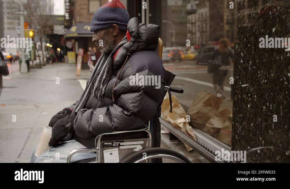 Man begging cup Stock Videos & Footage - HD and 4K Video Clips - Alamy