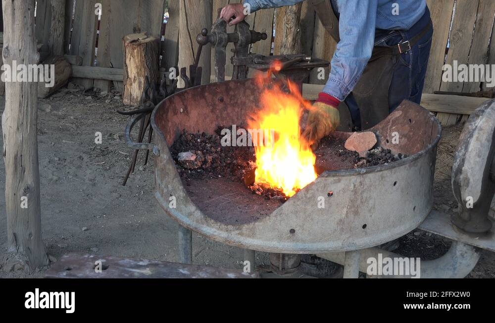 Blacksmith working with red hot forge 4K Stock Video Footage - Alamy