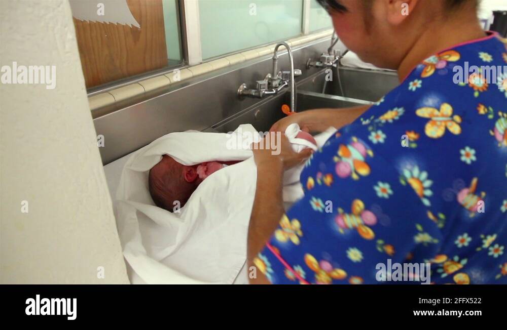 Shoulder cradle Stock Videos & Footage - HD and 4K Video Clips - Alamy