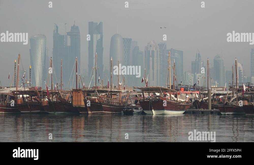 Qatar, Doha, dhow harbor, wooden vessels, modern skyline, Middle East ...