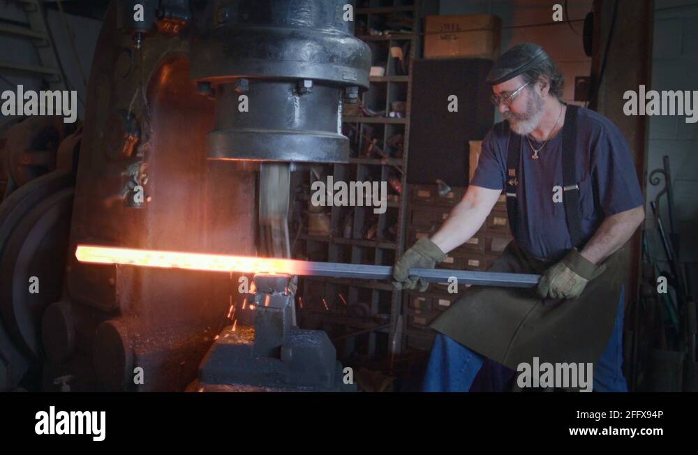 Blacksmith shaping hot iron hammer Stock Videos & Footage - HD and 4K ...