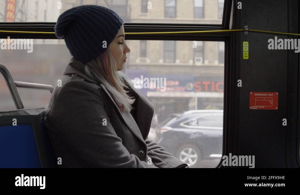 female passenger alone on city bus in 4k, New York City Manhattan NYC ...