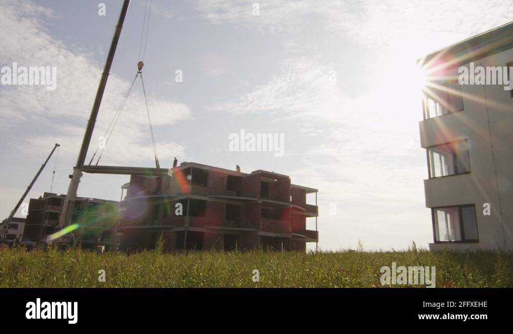 Crane lifting girder Stock Videos & Footage - HD and 4K Video Clips - Alamy