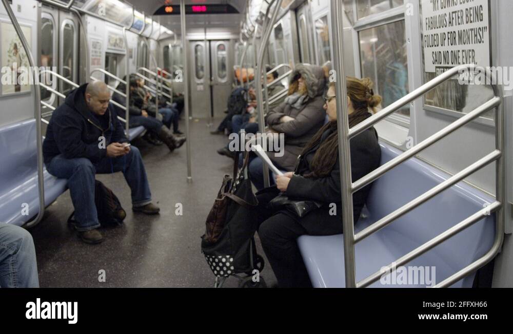 New Yorkers commuting riding inside interior subway train in 4K New ...