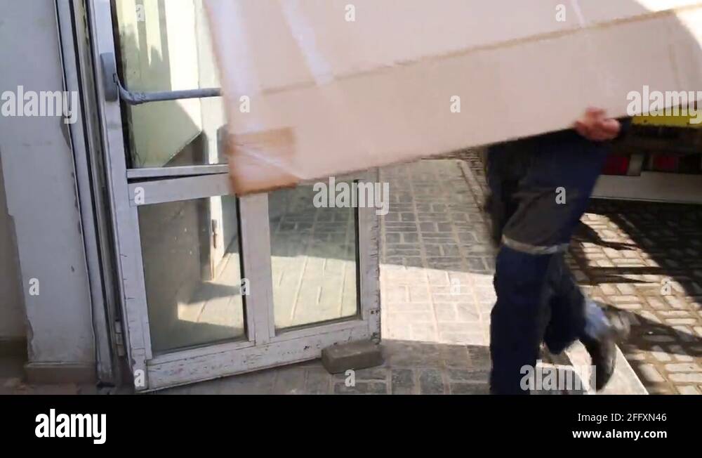Workers lifting heavy box Stock Videos & Footage - HD and 4K Video ...