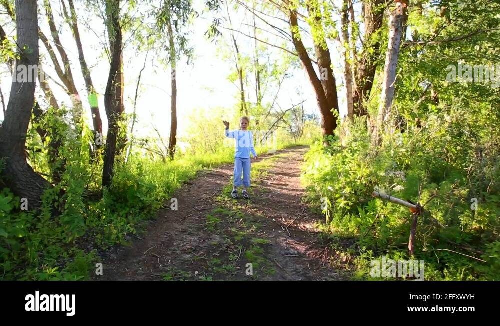 cheerful boy running away. camera movement. happy runing child Stock ...