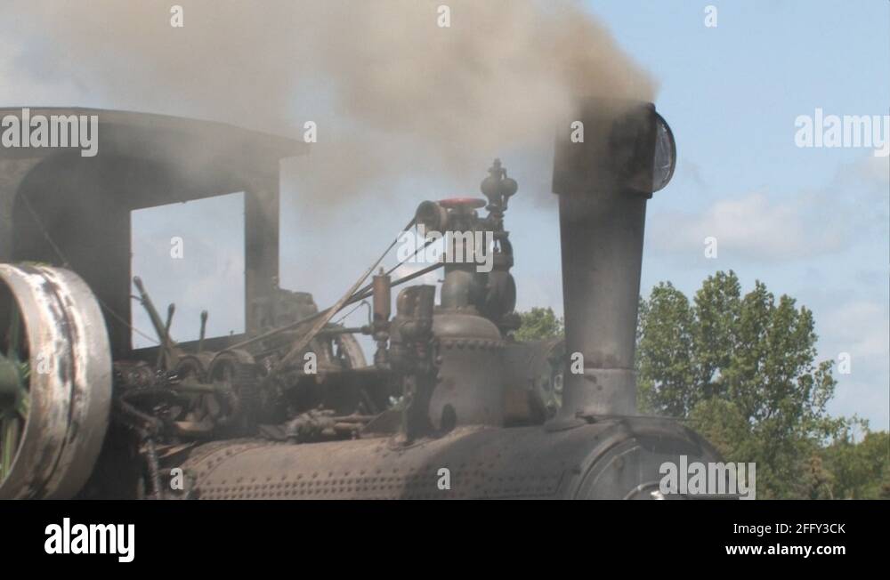 Zoom out from smoke stack of antique steam engine Stock Video Footage ...