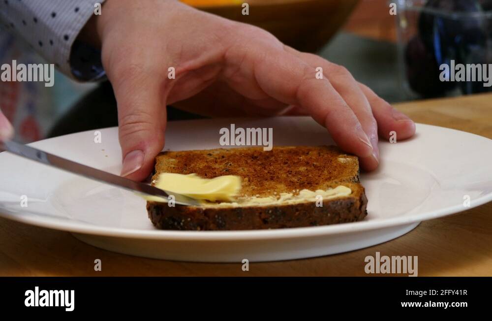 Buttering toast Stock Videos & Footage - HD and 4K Video Clips - Alamy
