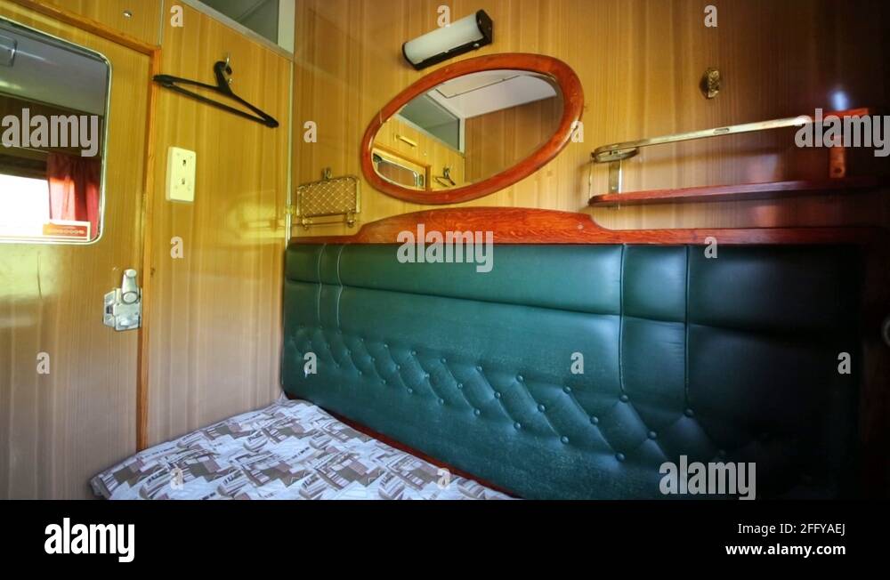 Empty business-class compartment in moving train with sofa Stock Video ...