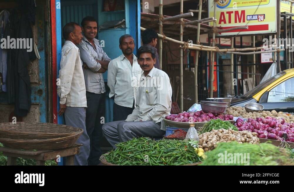 Portrait of Indian men at a street stand in Mumbai Stock Video Footage ...